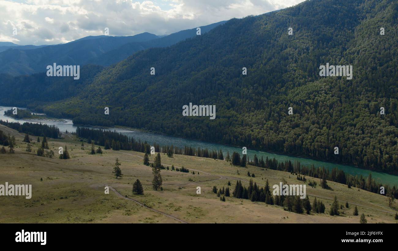 Blue Katun river in the middle of mountains of Ak-Kem valley in Altai ...