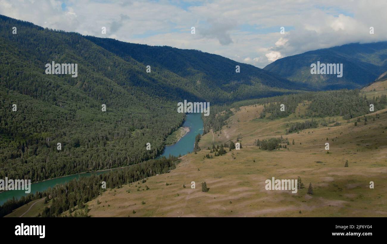 Blue Katun river in the middle of mountains of Ak-Kem valley in Altai ...