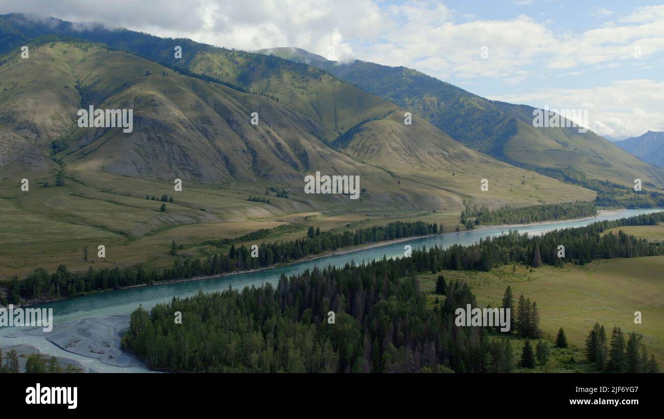 Blue Katun river in the middle of mountains of Ak-Kem valley in Altai ...