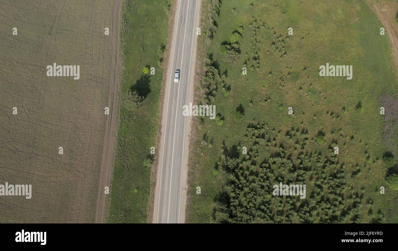 Asphalt road between rural fields in Ural, Russia. Beautiful summer ...