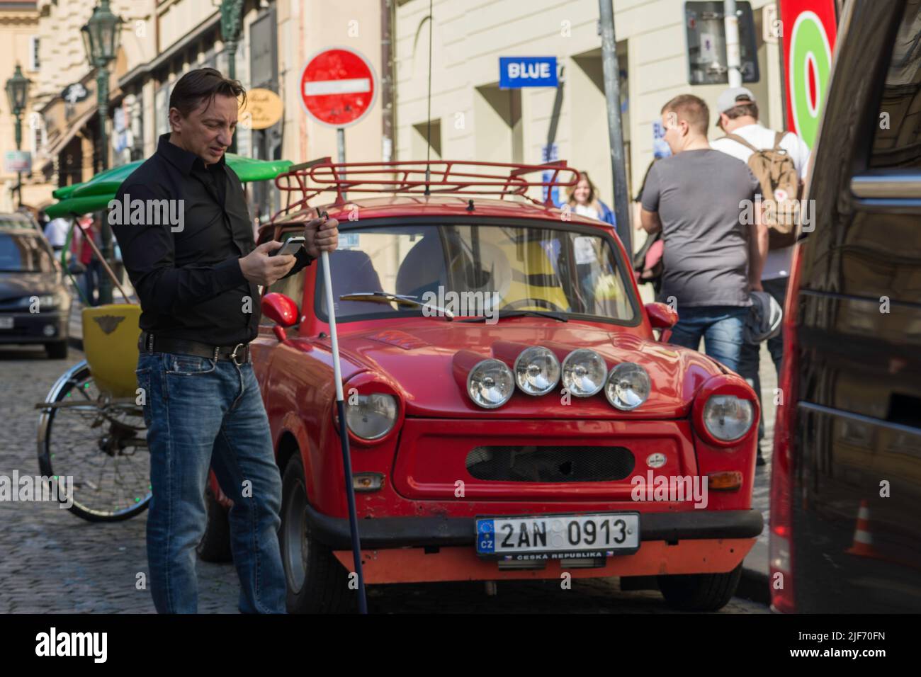 Old custom red mini car parked in the street. Trabant 601 Stock Photo ...