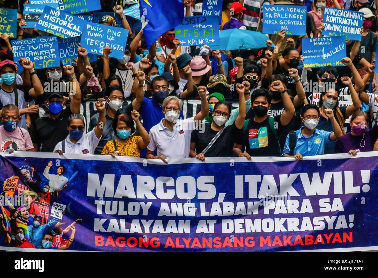 Manila, Philippines. 30th June, 2022. A crowd of protesters holds ...