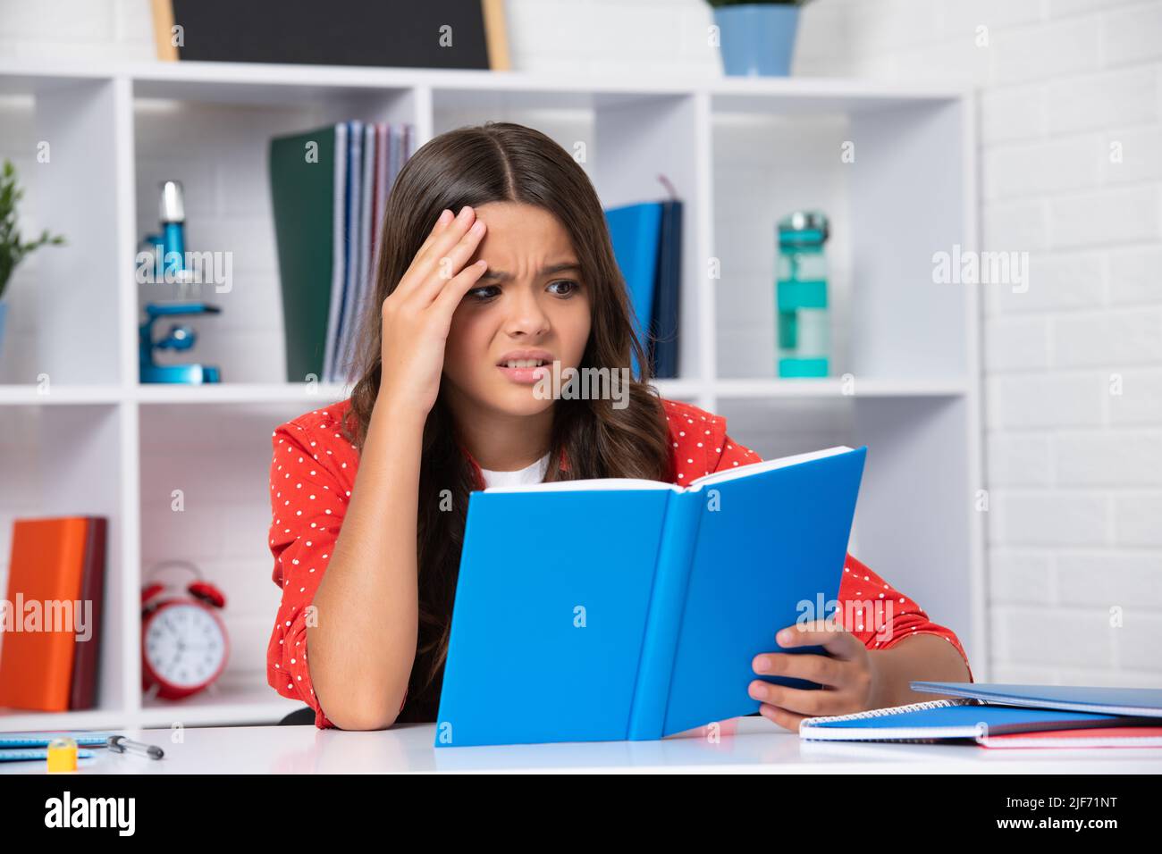 Angry teenager girl, upset and unhappy negative emotion. Back to school ...