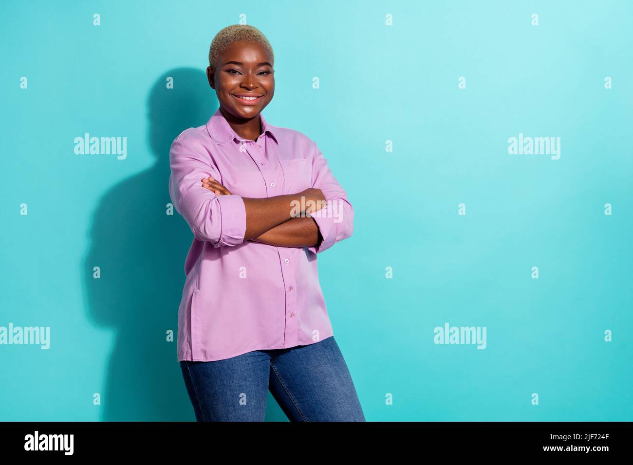 Photo of successful positive person folded hands beaming smile look ...