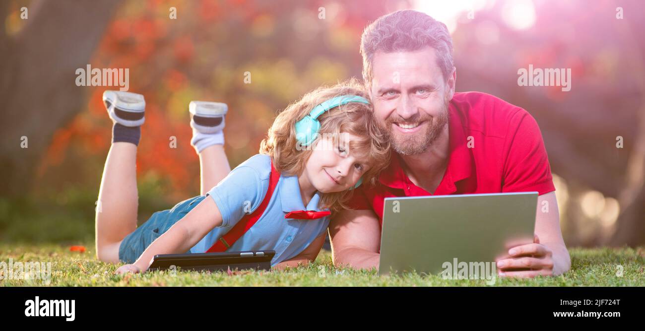 Banner of father on son school boy with laptop study online lying on ...