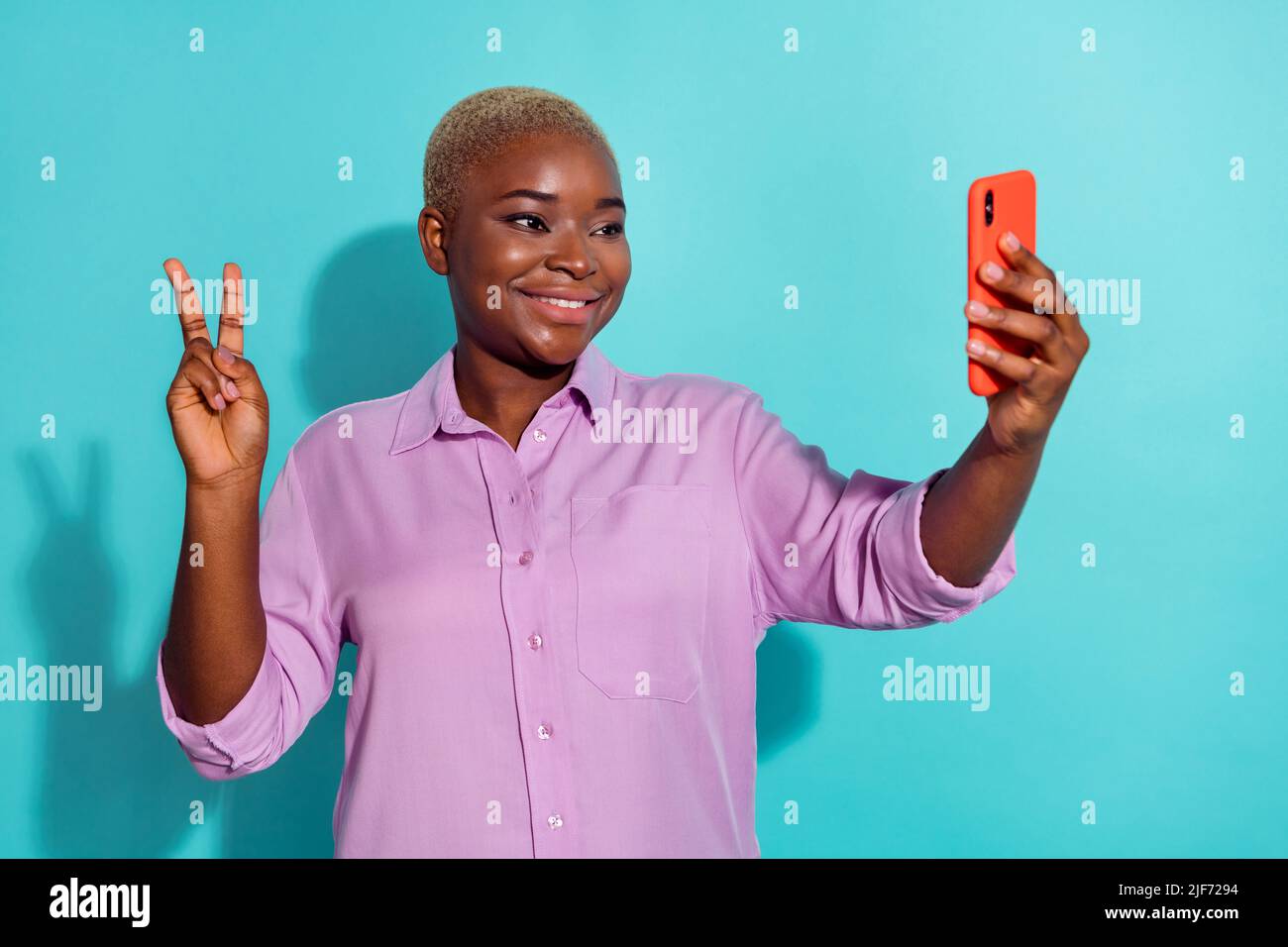 Photo of attractive person make selfie demonstrate v-sign blogging ...