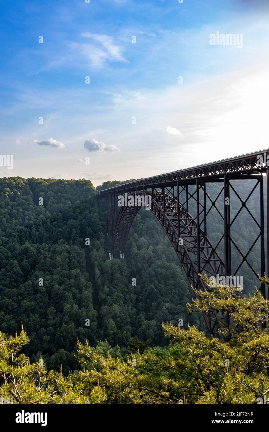 A vertical shot of New River Gorge Bridge under the beautiful sky with ...