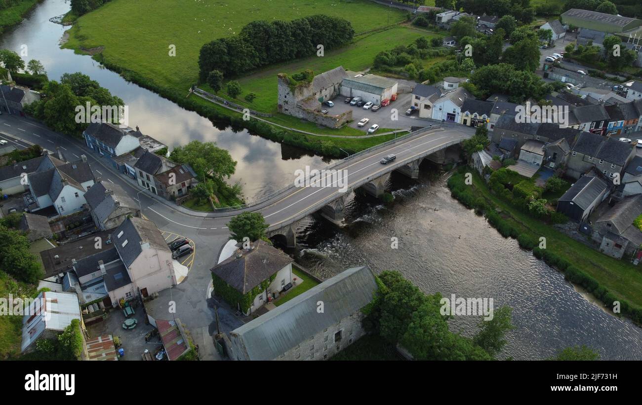 An aerial view of the Nore Bridge over the river in a beautiful ...