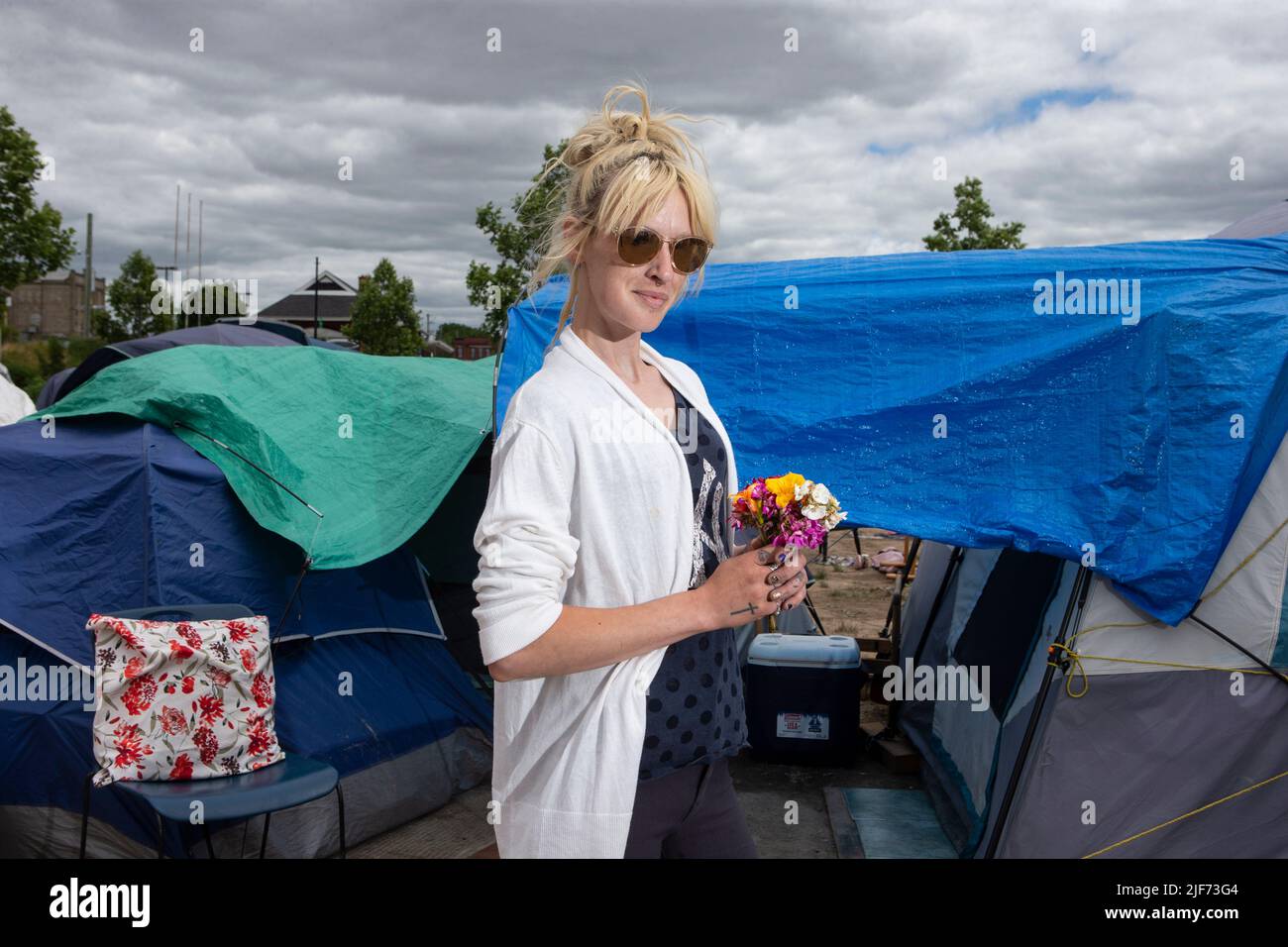 Britney O'Donnell is photographed outside her home in a large homeless ...