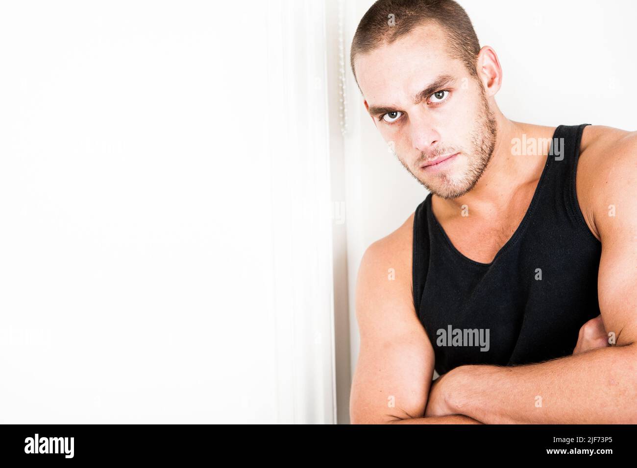 Athletic Confidence. A confident look on the face of an athletic male ...