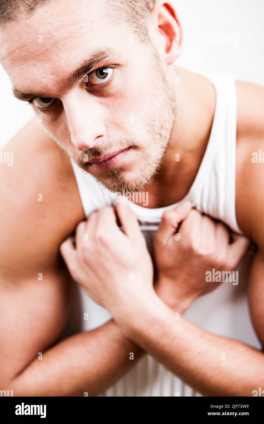 Vested Interest. A strong gaze from an athletic male model. From a ...
