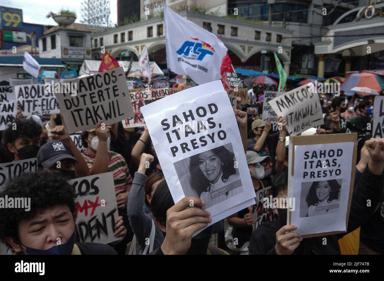 Progressive groups hold a protest at Plaza Miranda during the ...