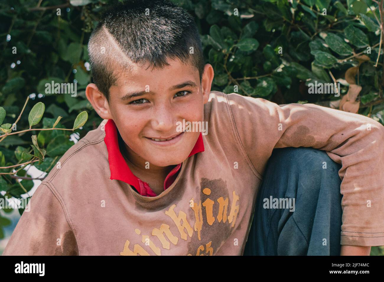 Refugee boy seen from back hi-res stock photography and images - Alamy