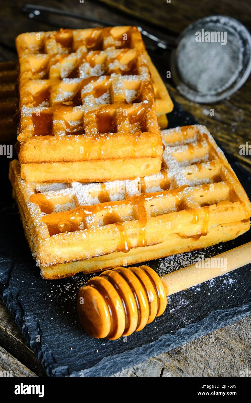 Sweet waffles drizzled honey hi-res stock photography and images - Alamy