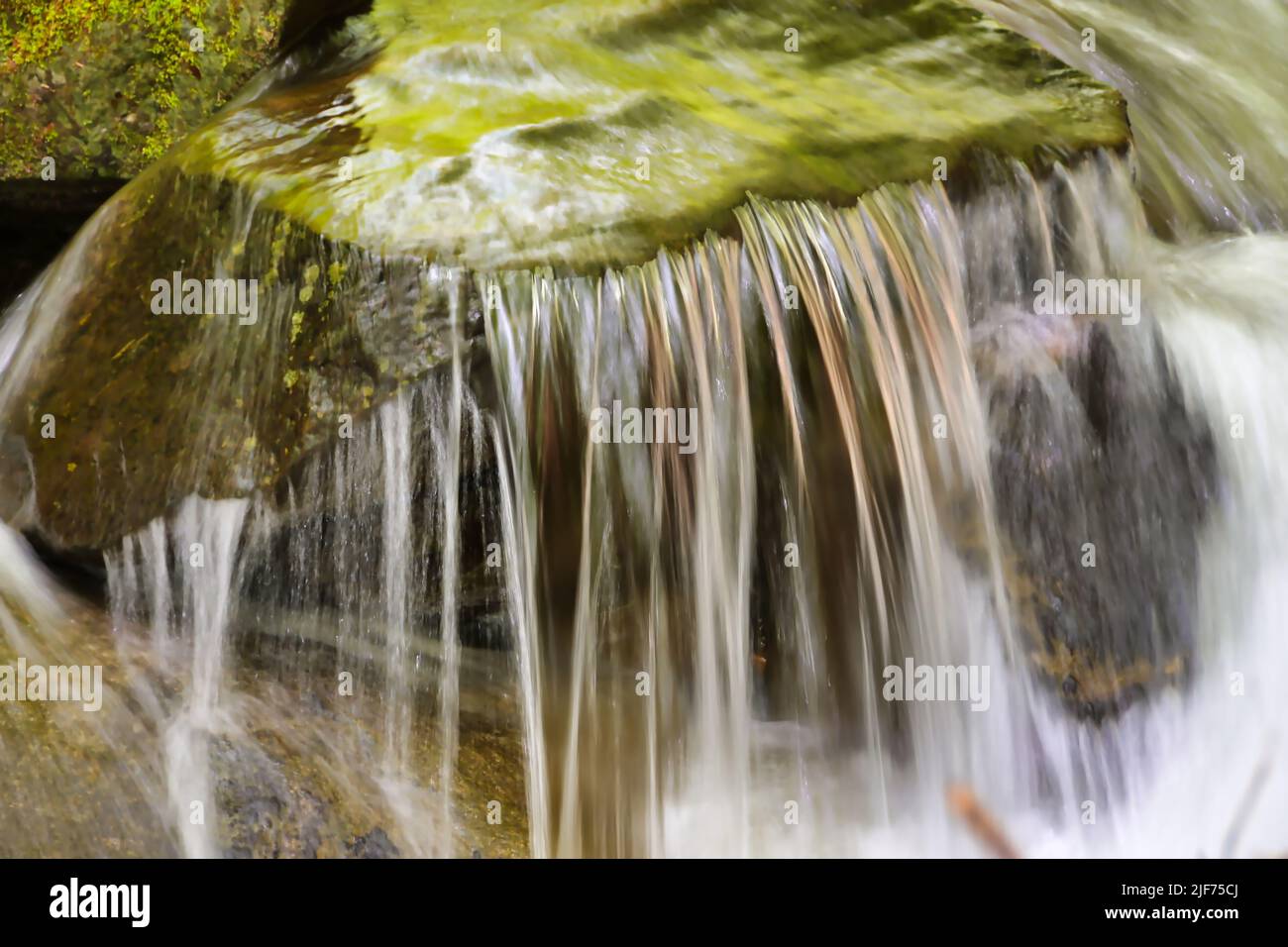 water flowing over rocks Stock Photo - Alamy