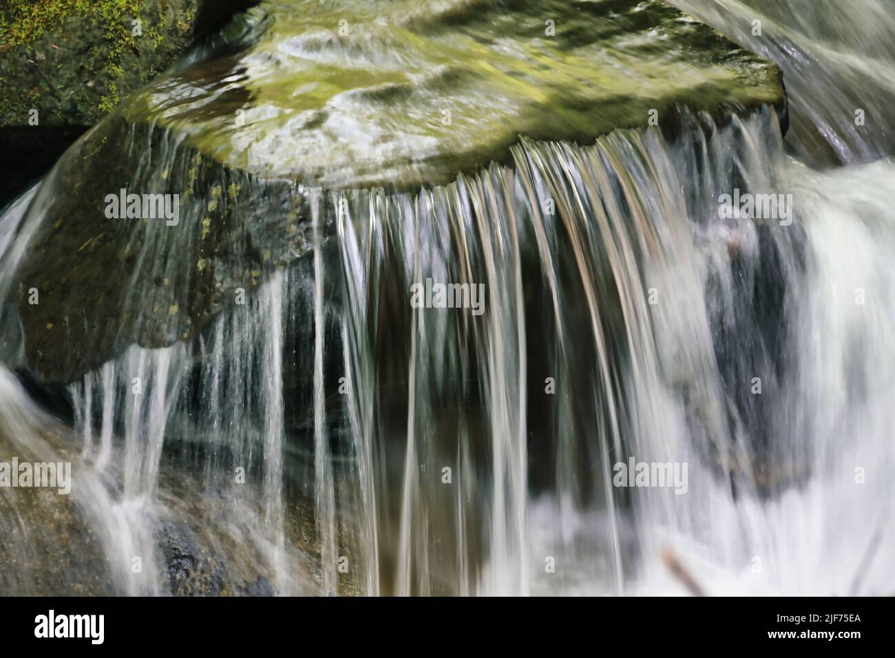 water flowing over rocks Stock Photo - Alamy