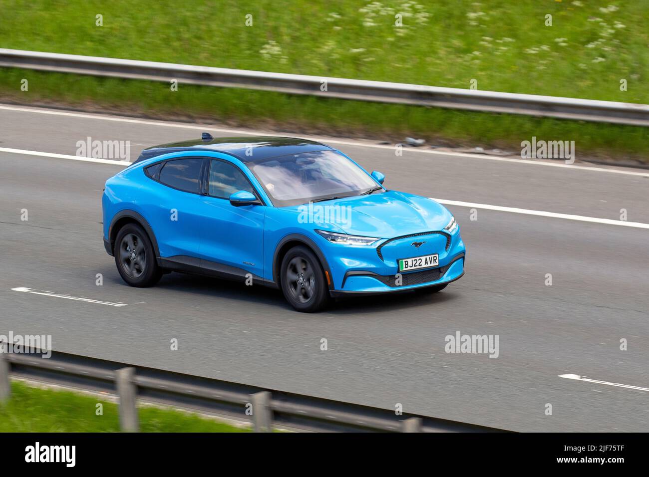 2022 Blue Ford Mustang MACH-E STD Range RWD Electricity; driving on the ...