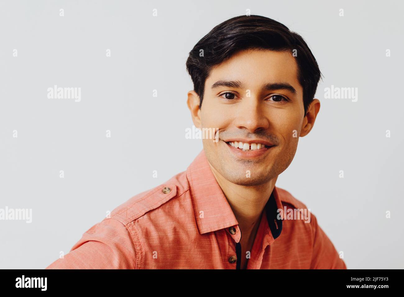 Headshot hispanic latino man black hair smiling handsome young adult ... Headshot hispanic latino man black hair smiling handsome young adult ...