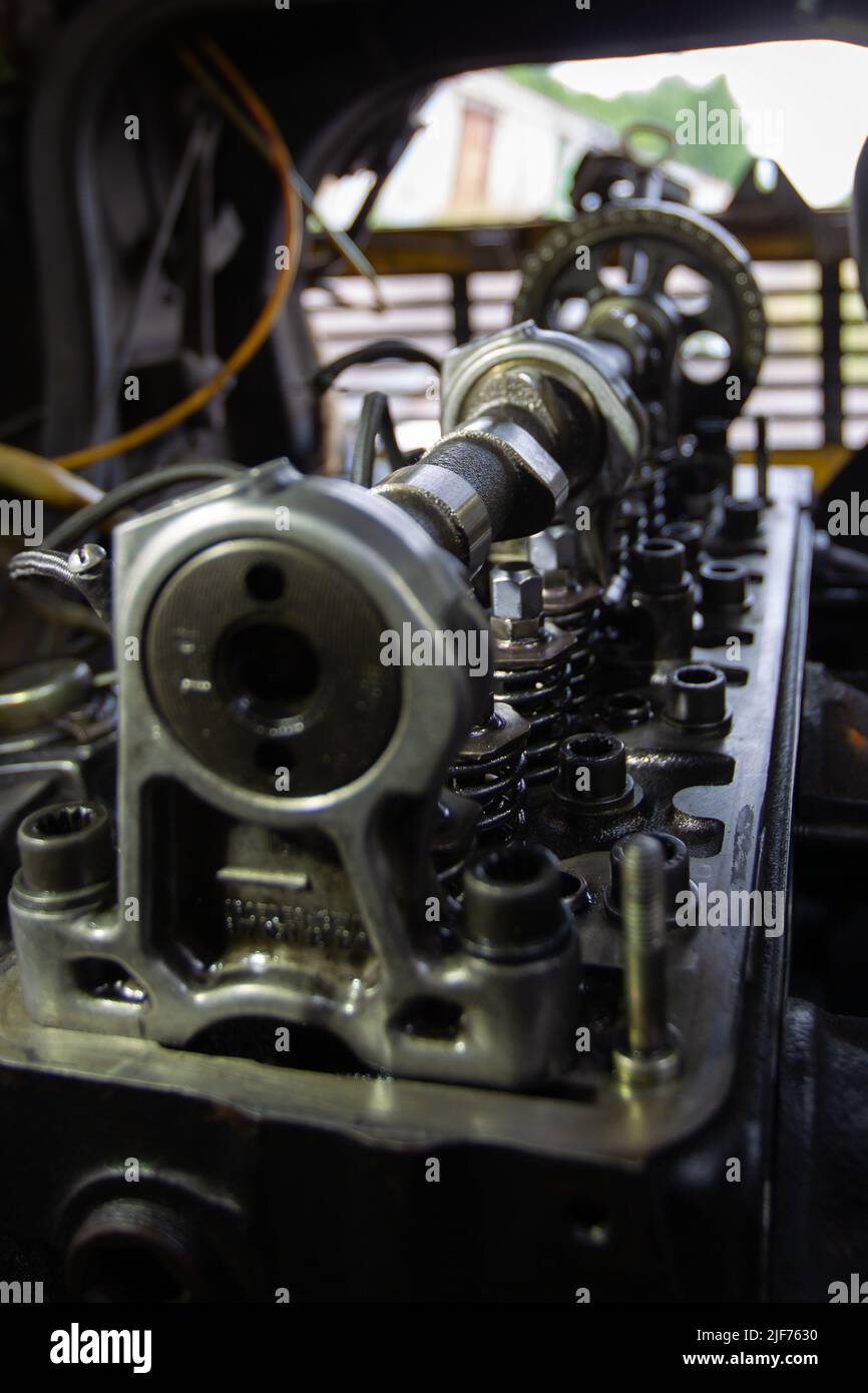 Mercedes diesel engine repair. Hands with a mechanic repairing Mercedes ...