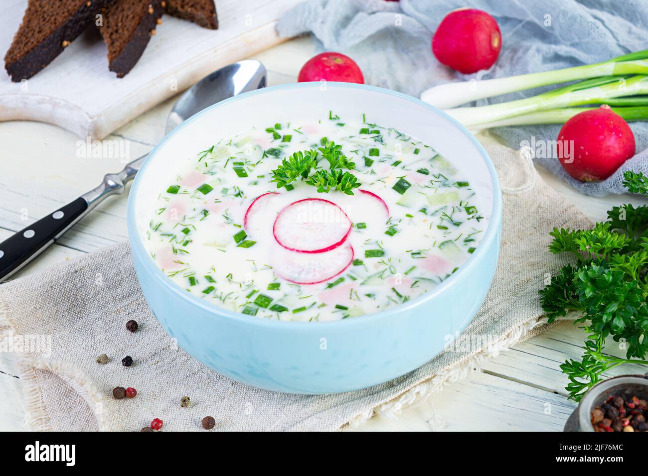 Summer cold soup with yogurt and vegetables. Traditional russian cold ...