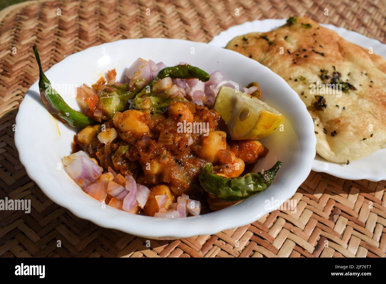 Tasty North Indian punjabi Delhi style Chhole Kulche dish. Chole made ...