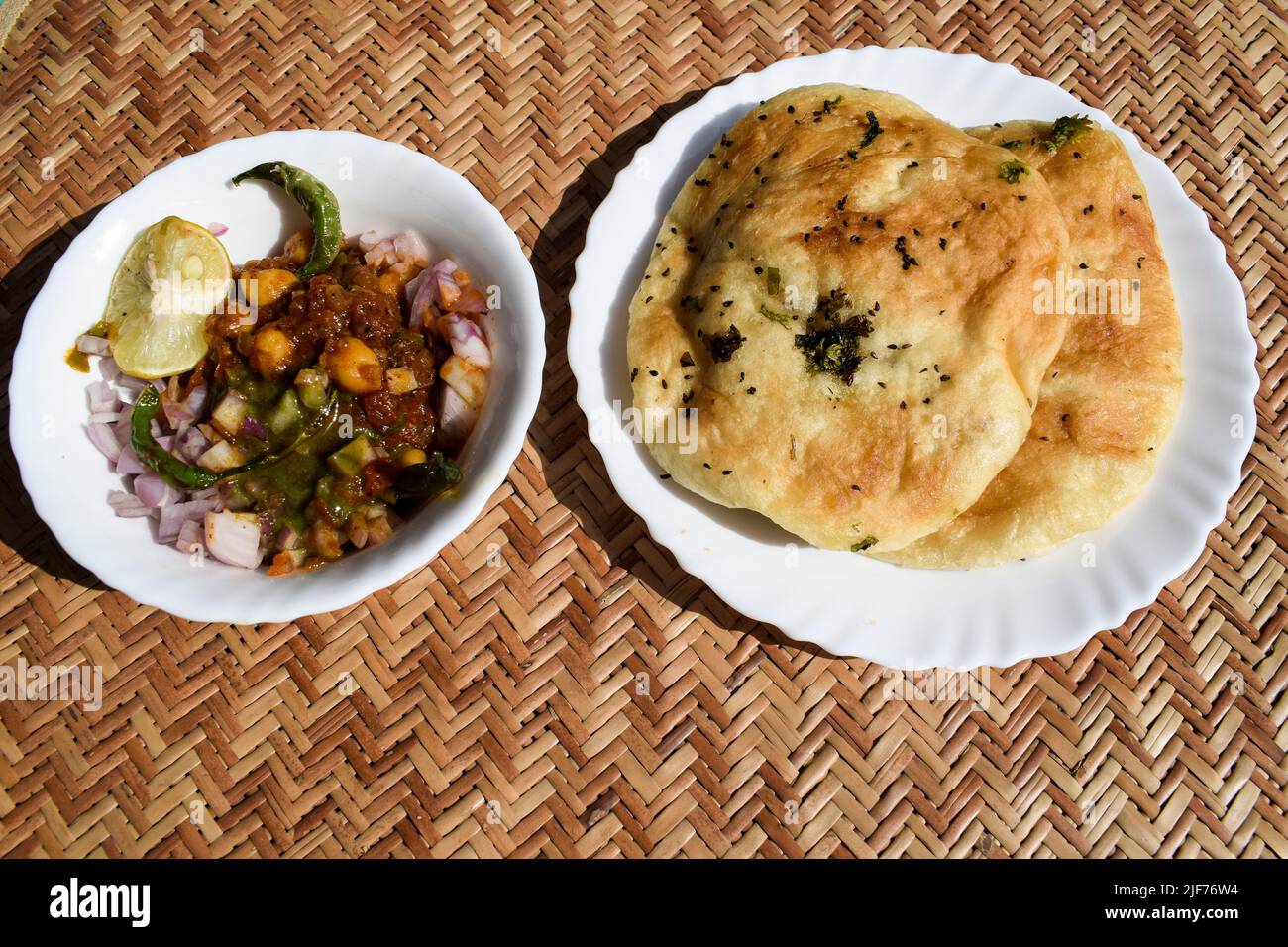 Tasty North Indian punjabi Delhi style Chhole Kulche dish. Chole made ...