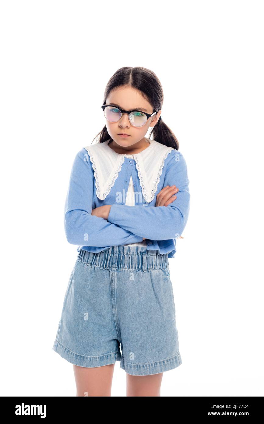 Angry pupil in eyeglasses crossing arms isolated on white Stock Photo ...