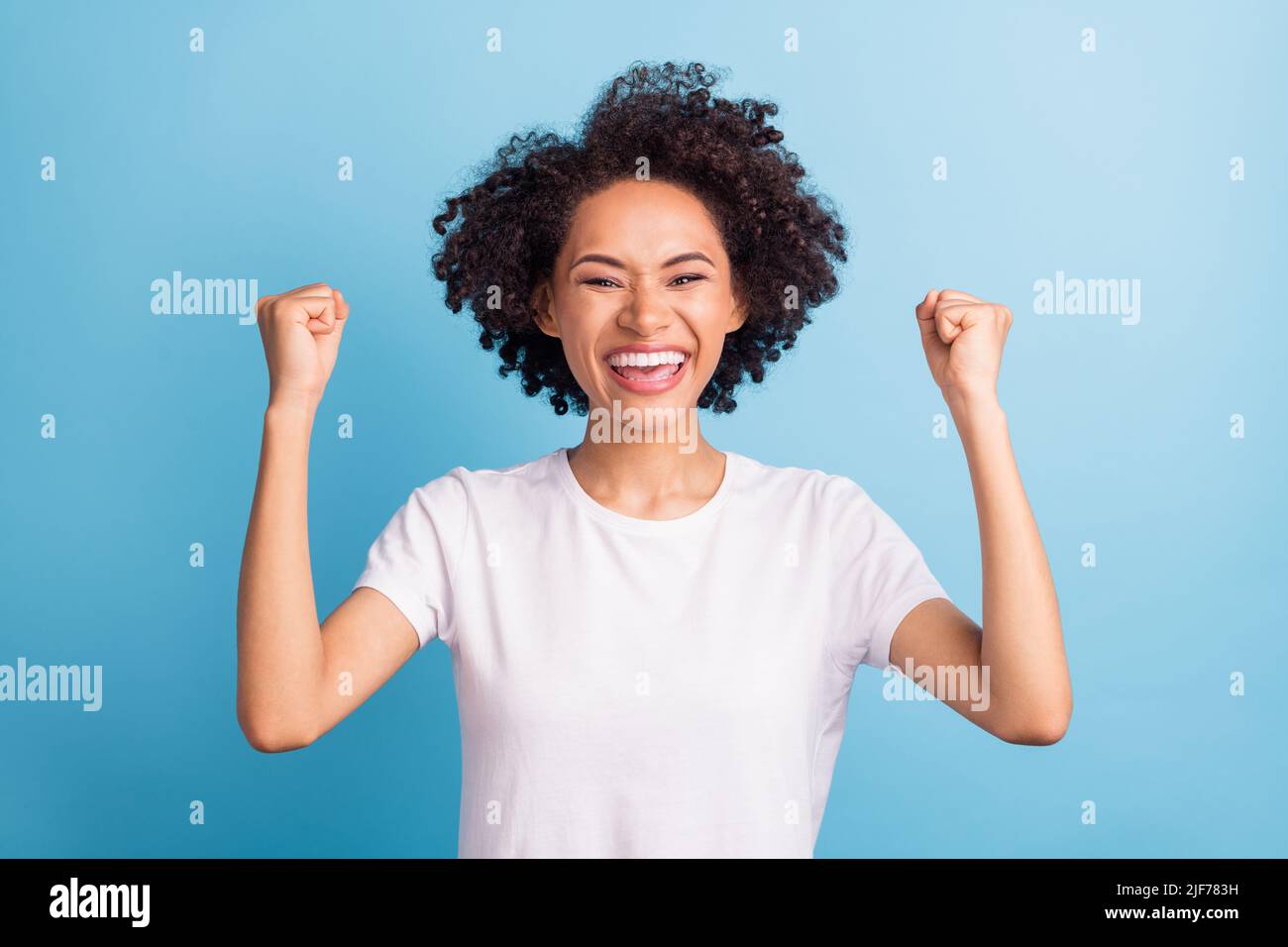 Portrait of attractive brunette cheerful girl rejoicing having fun ...