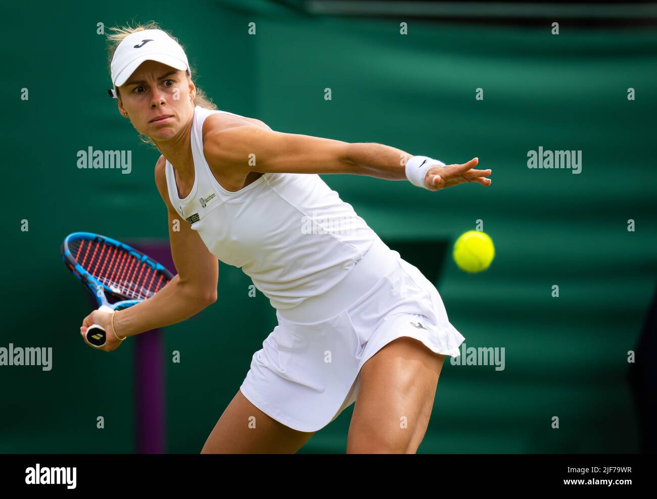 Magda Linette of Poland in action against Angelique Kerber of Germany ...