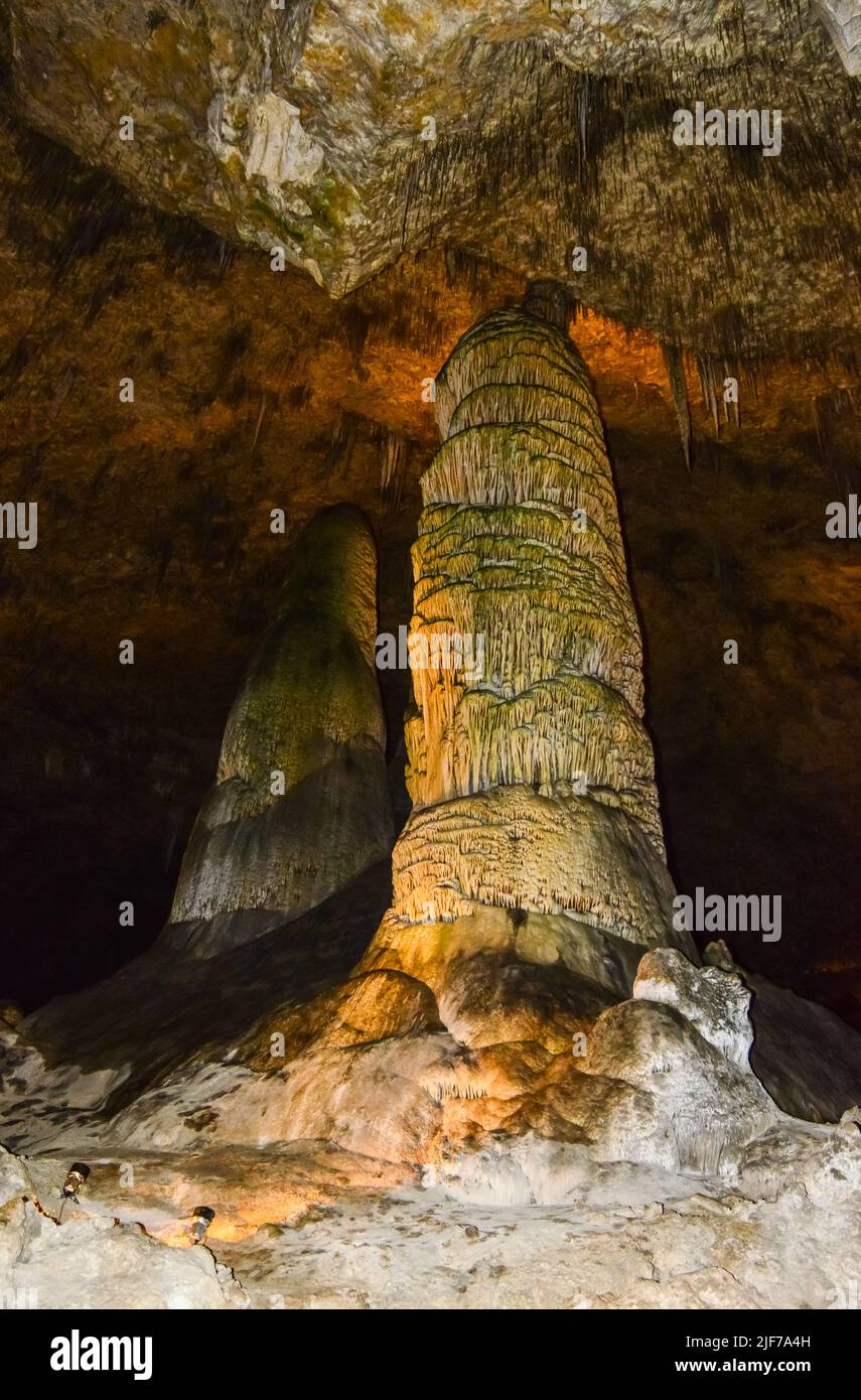 Calcite inlets, stalactites and stalagmites in large underground halls ...