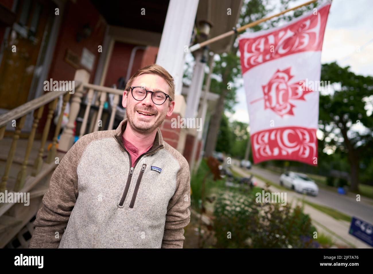 Blaine Chalk poses for a photo in front of his home in London, Ont ...