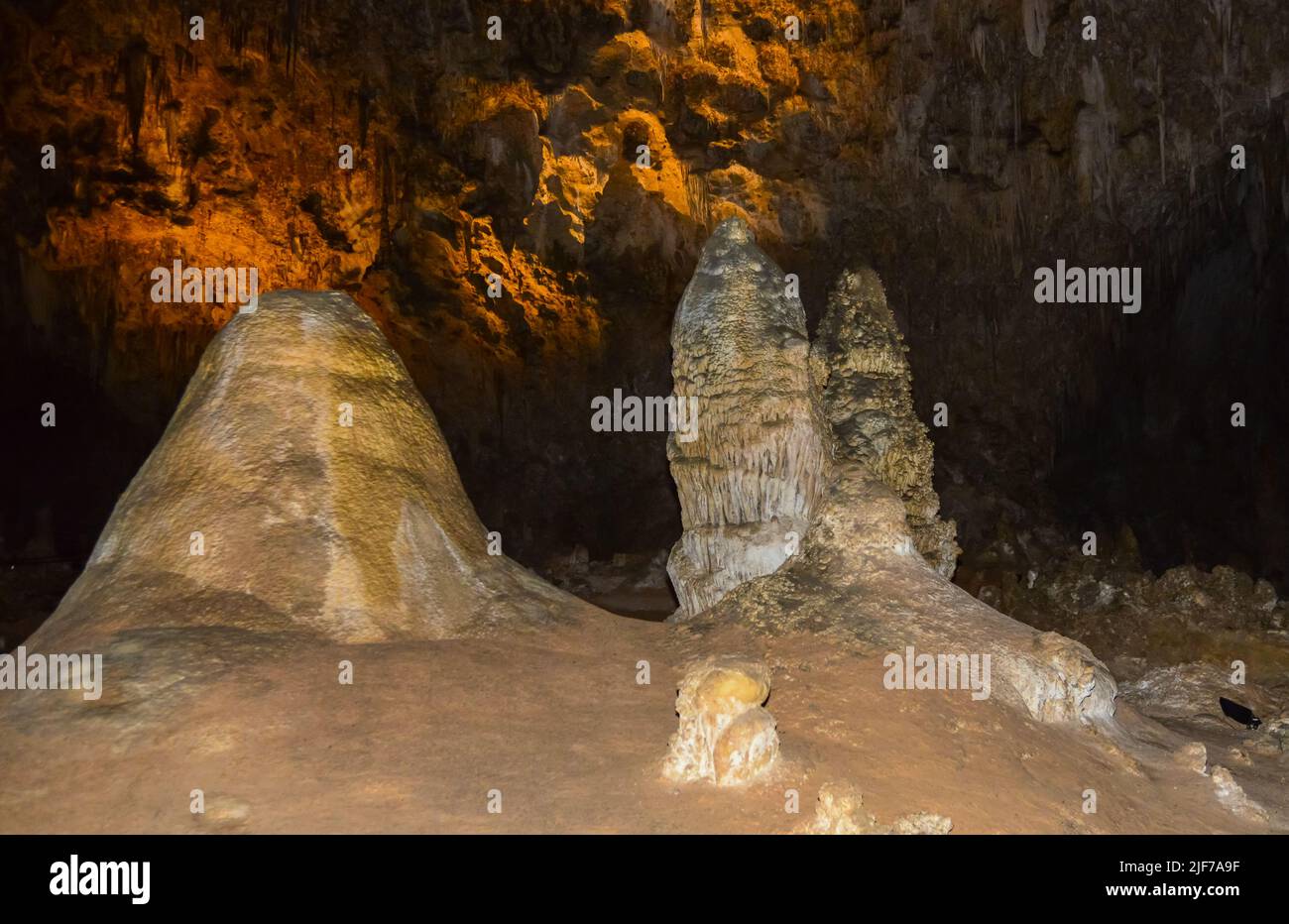 Calcite inlets, stalactites and stalagmites in large underground halls ...