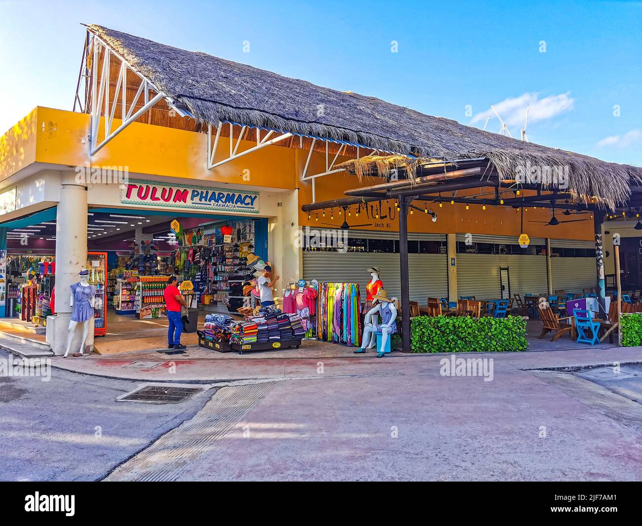 Tulum Mexico 24. February 2022 Driving thru typical colorful street ...