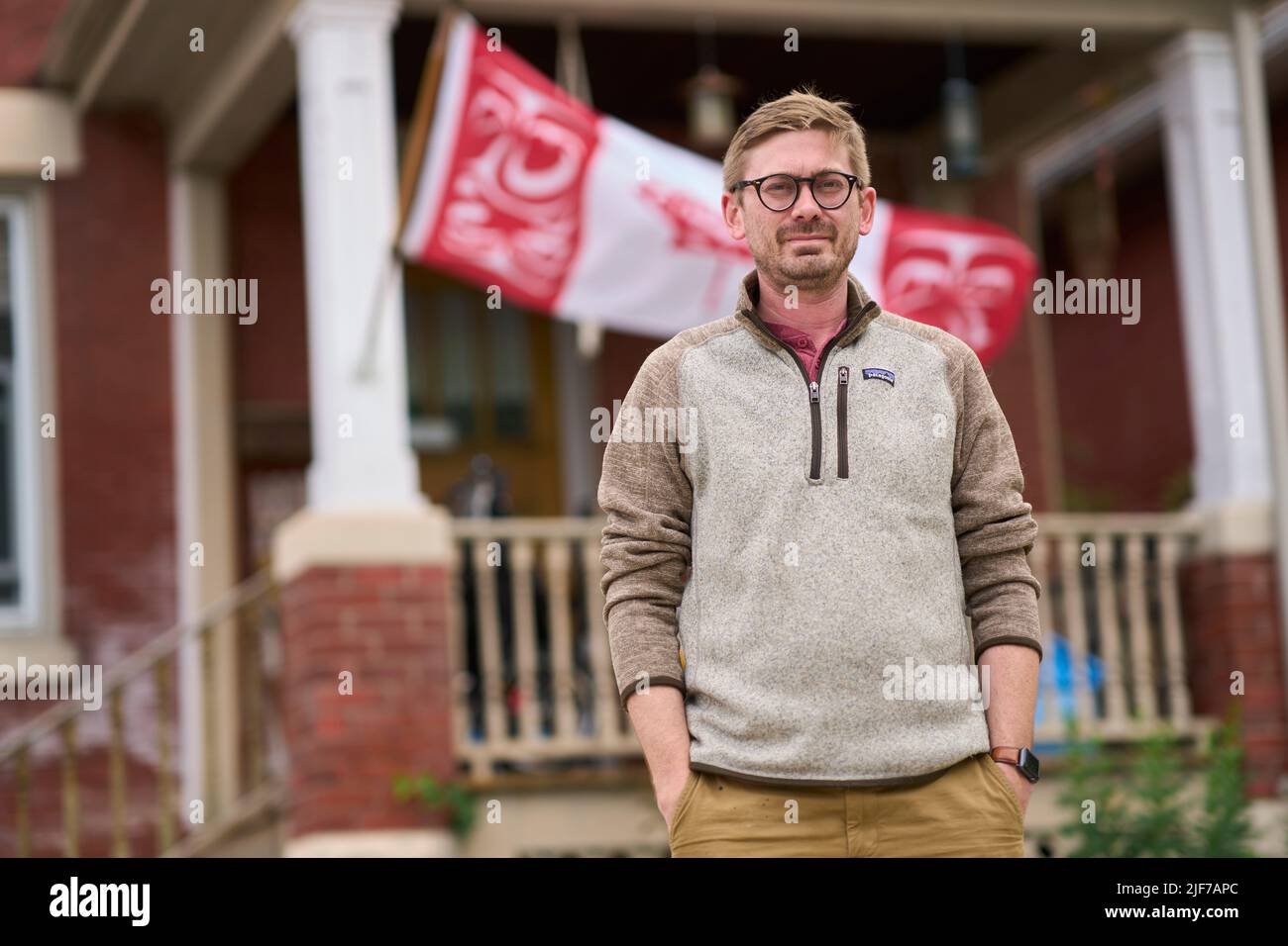 Blaine Chalk poses for a photo in front of his home in London, Ont ...