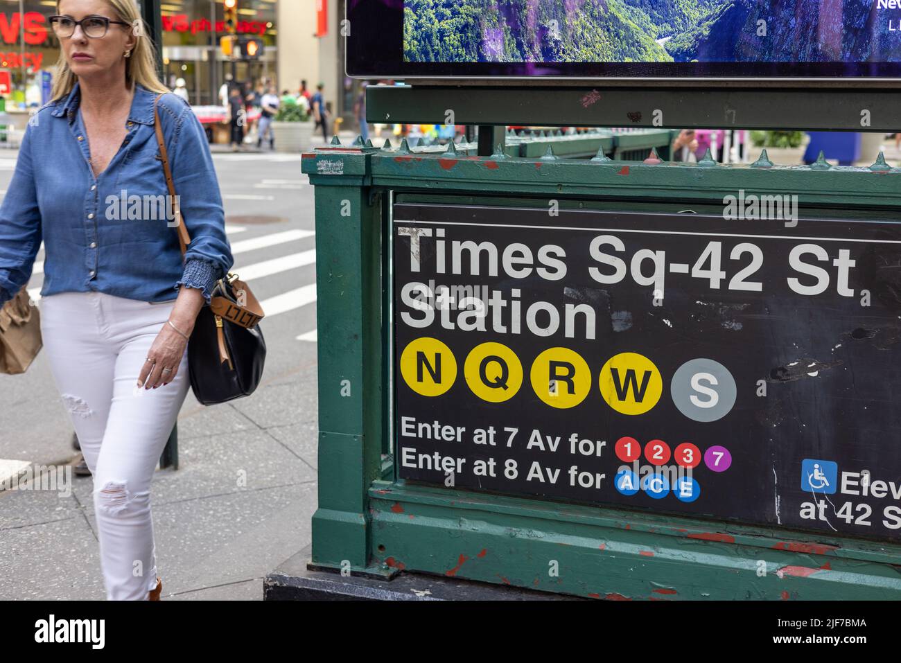 A close-up shot of the Times Square 42nd Street Subway Station entrance ...