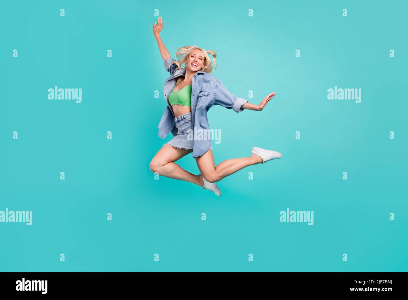 Full length photo of happy crazy happy cheerful woman wind blow summer ...