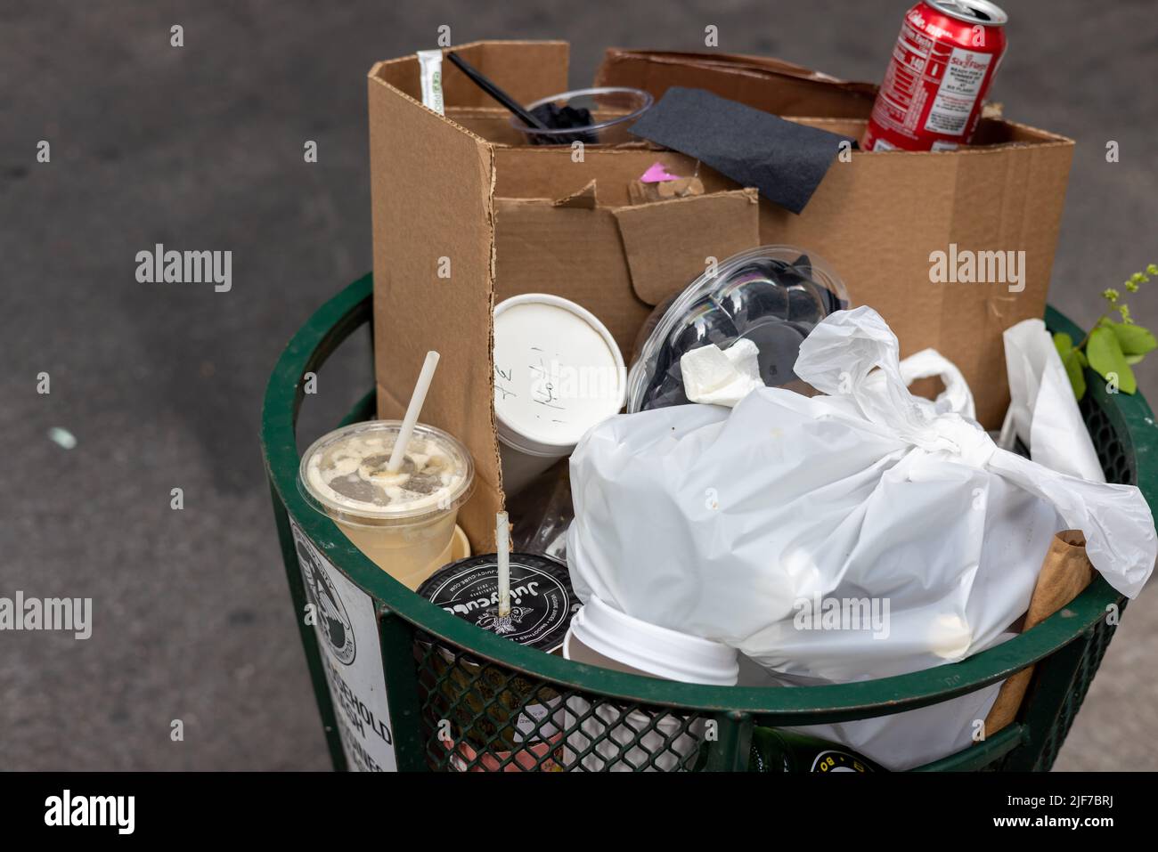Overfilled garbage basket hi-res stock photography and images - Alamy
