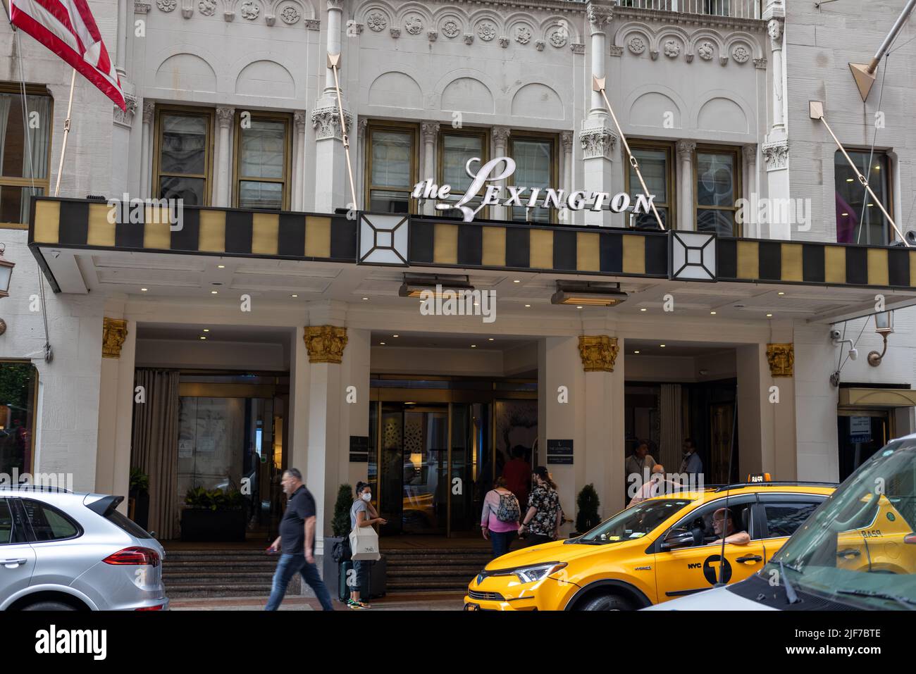 The Lexington Hotel front entrance with mid-day traffic Stock Photo - Alamy