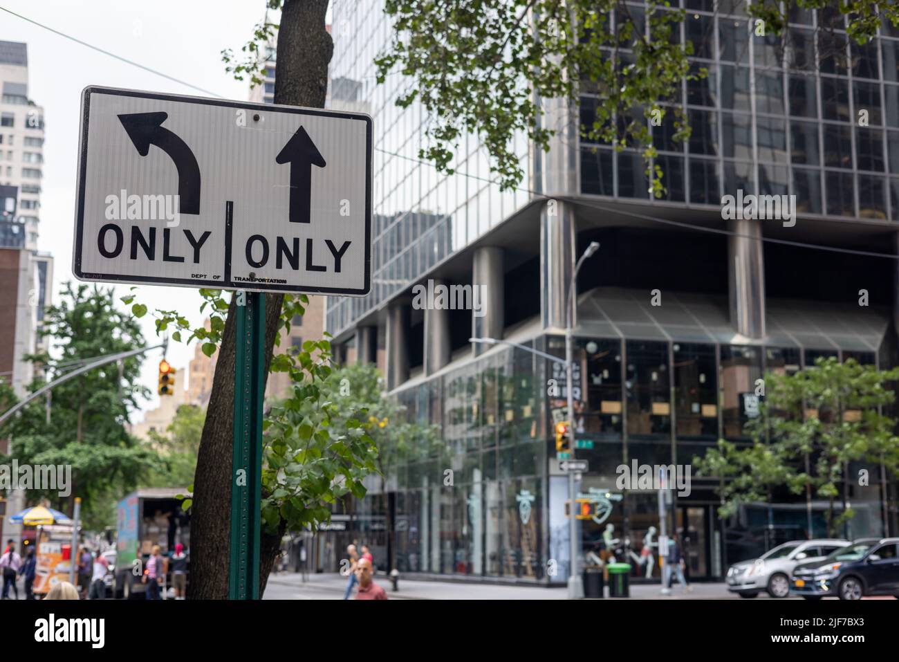 A close-up shot of Manhattan street signage directing traffic in ...
