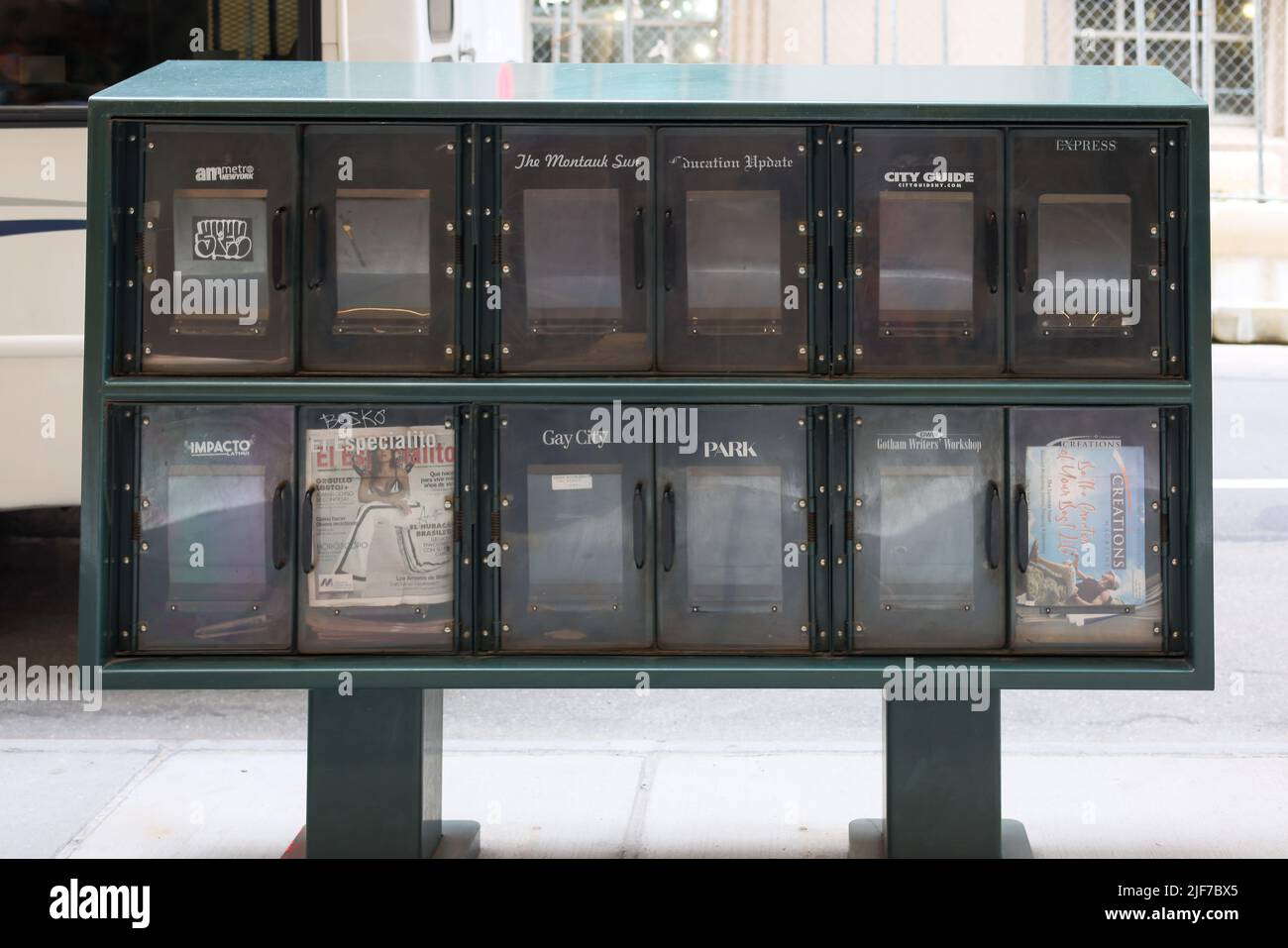 A close-up shot of a Newspaper Box display case for up to 12 brands in ...