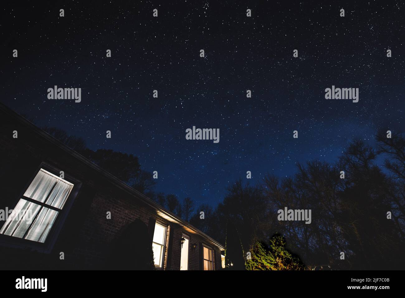 A view of the house in night sky and stars Stock Photo - Alamy