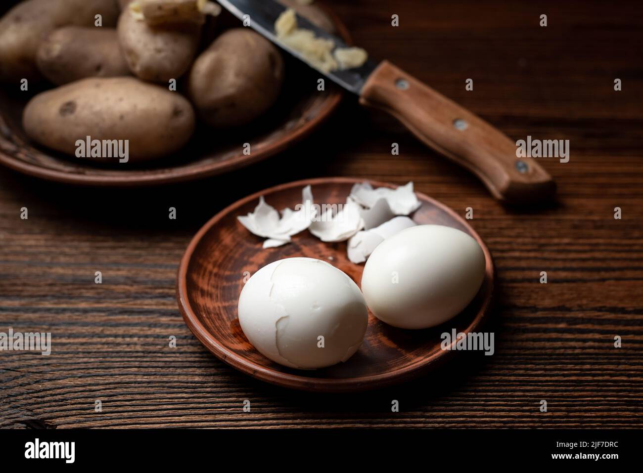 Young woman peeling boiled eggs hi-res stock photography and images - Alamy