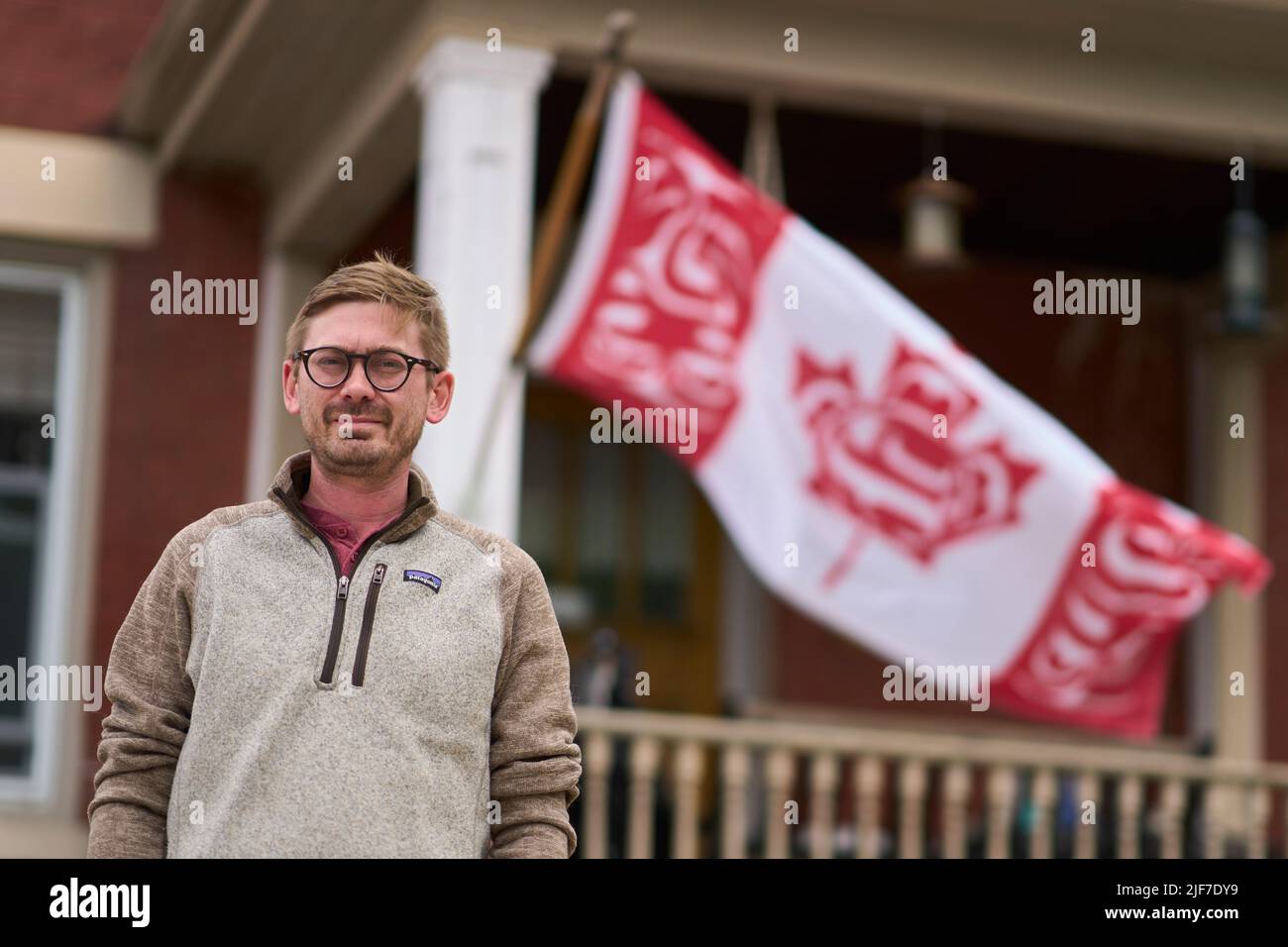 Blaine Chalk poses for a photo in front of his home in London, Ont ...
