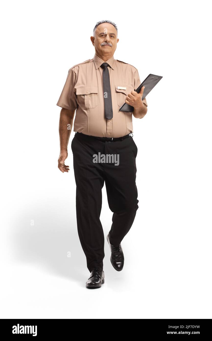 Full length portrait of a security officer holding a clipboard and ...