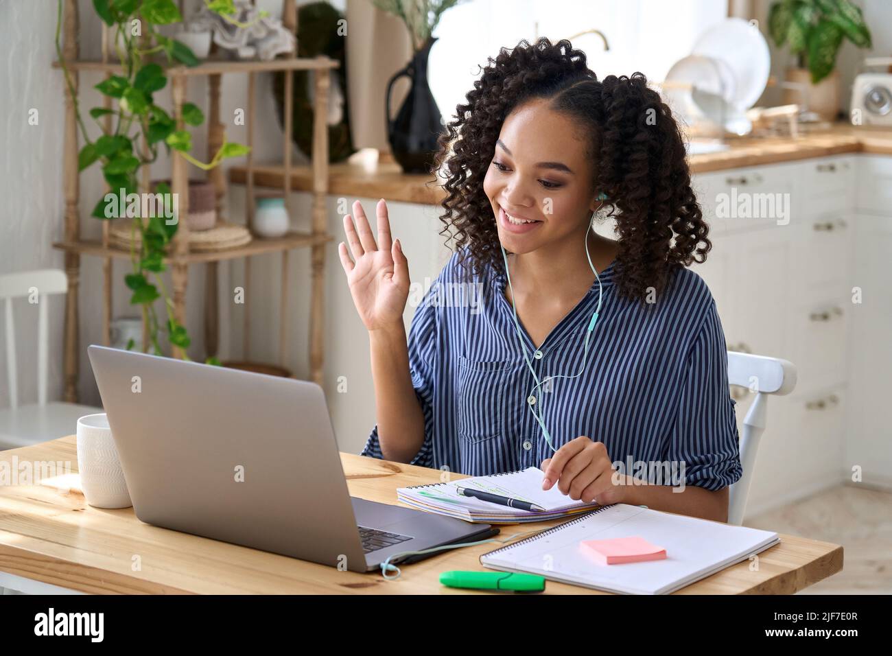 Happy African American teen girl student remote learning having online ...