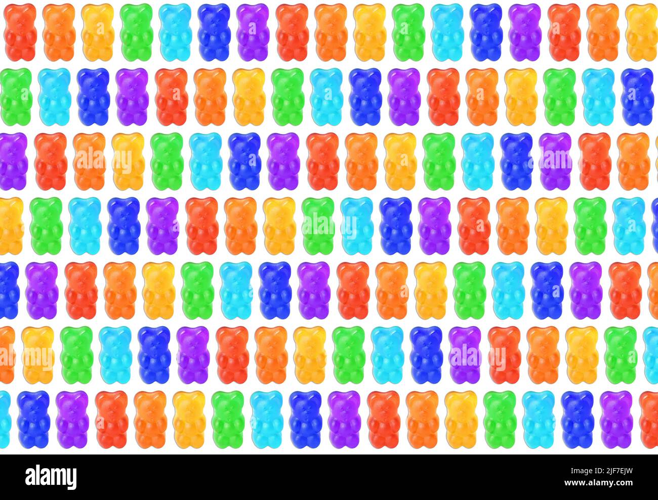 Abstract rainbow-colored gummy bears background Stock Photo - Alamy