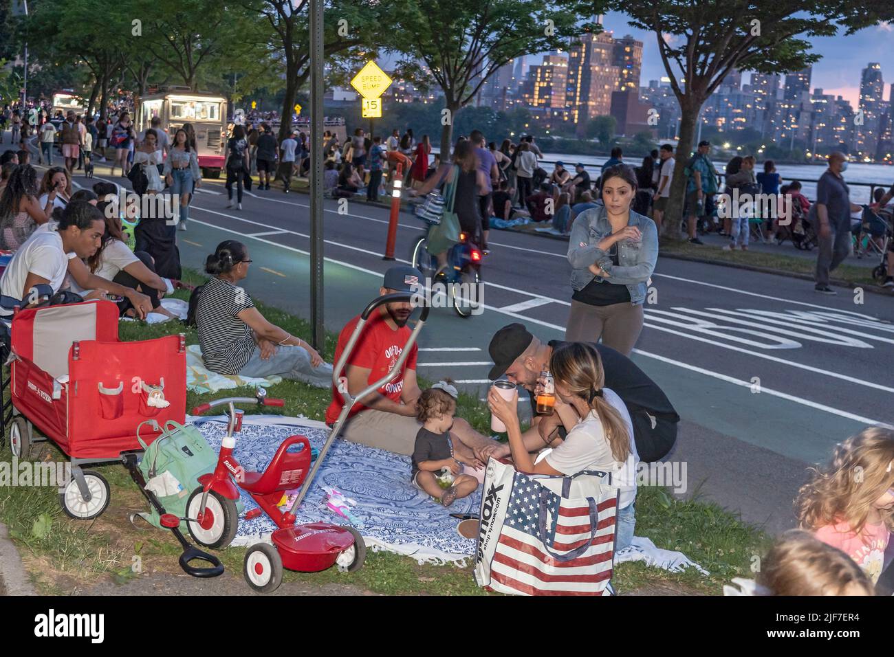 NEW YORK, NY - JUNE 29: Spectators gather for the Central Astoria ...
