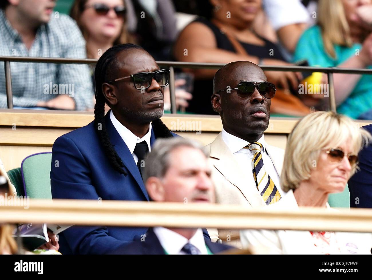 Patrick Hutchinson (right) and Aaron Hercules watch the action in the ...