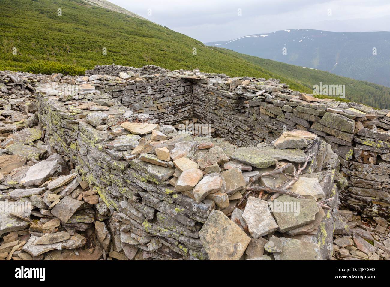 Stone fortification wall from the First World War covered with yellow ...