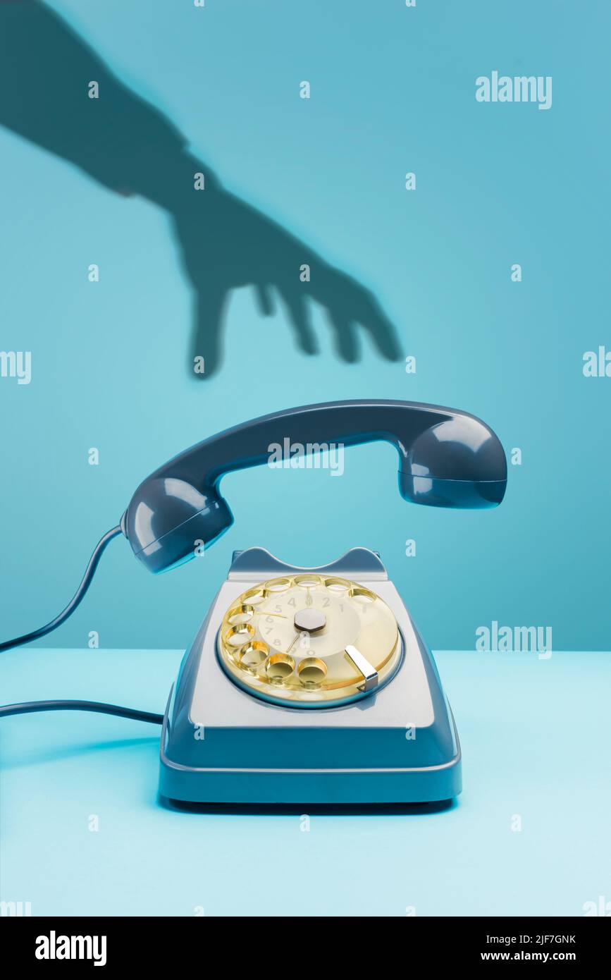 Hand Picking Up Phone